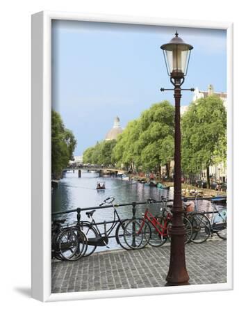 'Old Gas Lamp Post and Bicycles on a Bridge over a Canal in Amsterdam ...