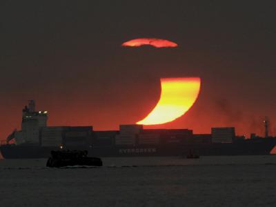 'Partial Solar Eclipse as the Sun Sets at Manila's Bay, Philippines ...
