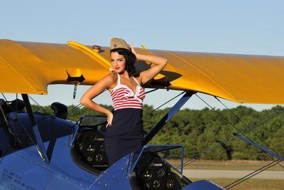 'Patriotic Pin-Up Girl Standing Inside the Cockpit of a Stearman ...