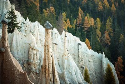 Picturesque view on natural earth pyramids in autumn season. Renon ...