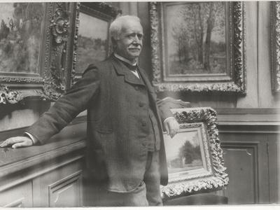 Portrait of Paul Durand-Ruel (1831-1922) in his gallery, c. 1910 ...