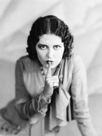 'Portrait of Woman Shushing' Photo | AllPosters.com