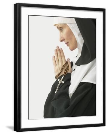 'Praying Nun Holding Rosary' Photographic Print | AllPosters.com