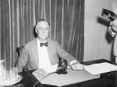 'President Roosevelt prepares to broadcast on his recovery programme ...