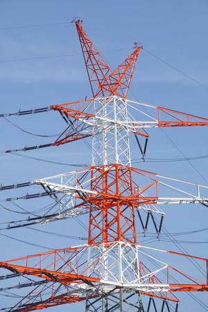'Red white power pole, high-voltage pole, with transmission lines ...
