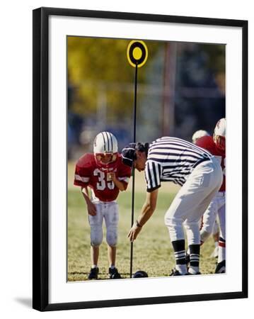 'Referee Measuring for a First Down During a During a Pee Wee Football ...