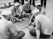 'Sailors Aboard a Us Navy Cruiser at Sea Playing a Game of Dominoes on ...