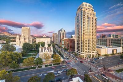 Salt Lake City, Utah, USA downtown cityscape over Temple Square at dusk ...