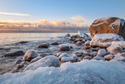 Scenic winter landscape with sea and sunrise at morning. Beautiful ...