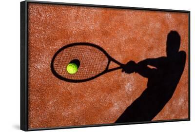 'Shadow Of A Tennis Player In Action On A Tennis Court (Conceptual ...