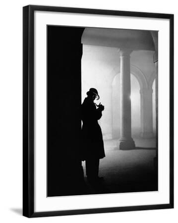 'Silhouette of Man Lighting Pipe' Photographic Print | AllPosters.com