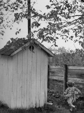 'Small Child Running to the Outhouse at Rural School' Photographic ...