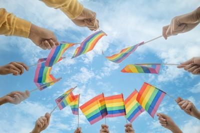 'Diversity People Hands Raising Colorful Lgbtq Rainbow Flags Together ...