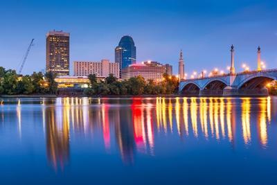 Springfield, Massachussetts, USA downtown skyline on the river at dusk ...
