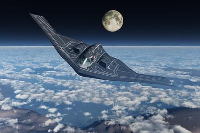 A North American B-2 Spirit Stealth Bomber Flying at High Altitude ...