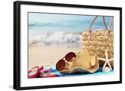 'Summer Beach Bag with Straw Hat,Towel,Sunglasses and Flip Flops on ...