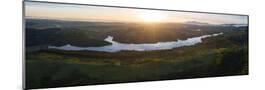 Sunrise greets the tranquil, green hills of the east bay region of ...