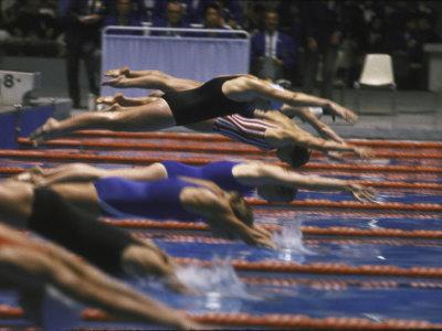 'Swimmers Diving to Start a Race at Summer Olympics' Photographic Print ...
