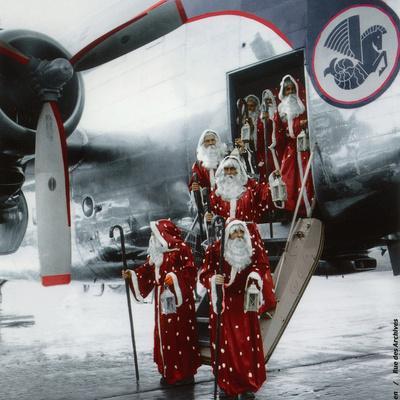 'Ten Santa Claus Deplaning December 15, 1953. Colorized Document' Photo ...