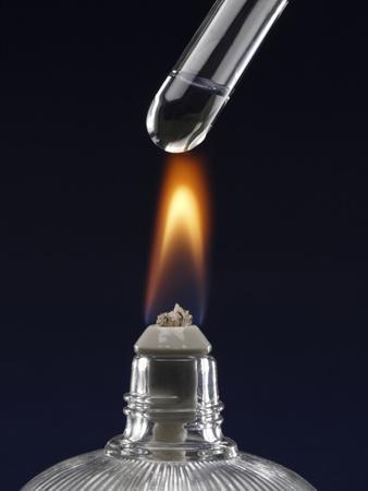 'Test tube with liquid, over flame' Photographic Print | AllPosters.com