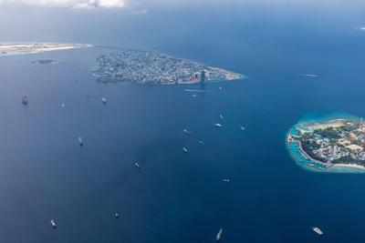 The capital of Maldives from the sky. Aerial view on male the capital ...