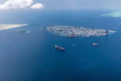 The capital of Maldives from the sky. Aerial view on male the capital ...