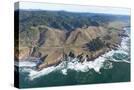 The cold Pacific Ocean washes onto the rugged coastline of Northern ...