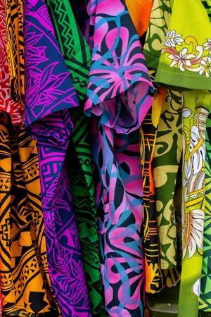 'The Kingdom of Tonga, Neiafu. Brightly colored souvenir shirts ...