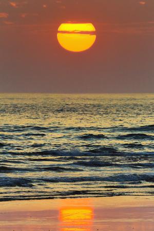 'The Sun Setting Off Playa Guiones Surf Beach' Photographic Print - Rob ...