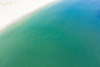 'The waters of the Atlantic Ocean bathe a scenic beach on Cape Cod ...