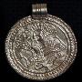 Gold bracteate from Sweden showing Odin and a raven. Artist: Unknown ...