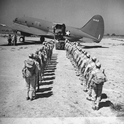 'US Armed Forces C46 Cargo Plane Loading Troops and Equipment ...