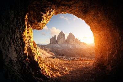 'View from the cave in mountain against Three peaks of Lavaredo during ...