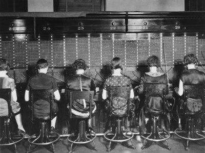 'View of Row of Operators from Behind at Busy Switchboard at Telephone ...