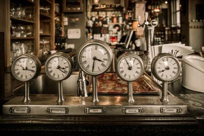 'Vintage Clocks on a Bar Counter in a Pub' Photographic Print - NejroN ...