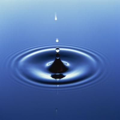 'Water Droplet Hitting Water Surface Creating Ripples' Photographic ...