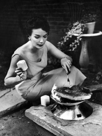 'Well-Dressed Woman Cooking a Large Steak on the Aluminum Disposable ...