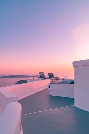 'White wash architecture on Santorini Island, Greece. The view toward Caldera sea with relaxing ...