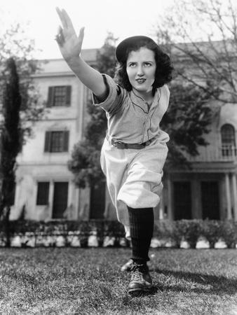 'Young Woman in Baseball Uniform Throwing a Ball' Photo | AllPosters.com