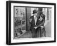 Young Woman with Man Pointing at Cats in Cage for Sale Photo ...