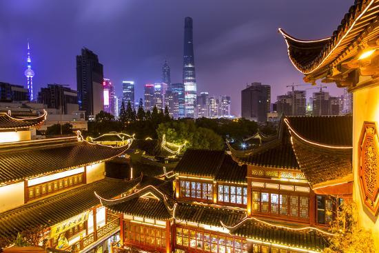Yuyuan Gardens And Bazaar With The Shanghai Tower Behind Old Town