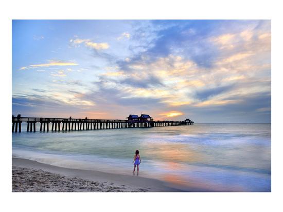 'Girl in front of the Pier on the Beach of Naples on the Gulf Coast ...