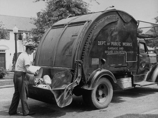 'Garbage Man Emptying Trash into Back of Garbage Truck' Photographic ...