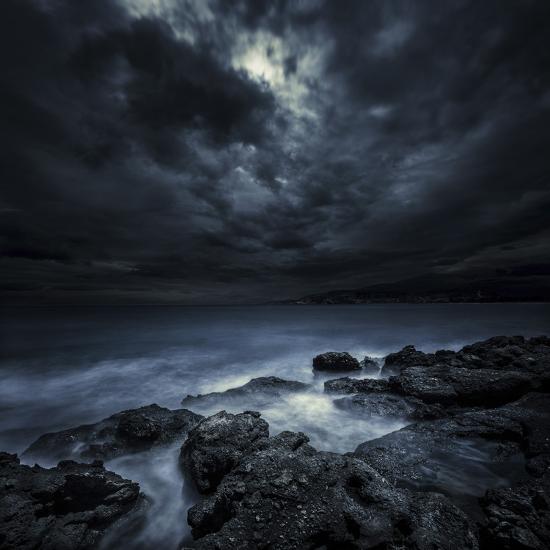 'Black Rocks Protruding Through Rough Seas with Stormy Clouds, Crete ...