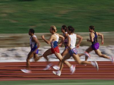'Male Runners Competing in a Track Race' Photographic Print ...
