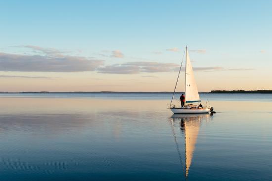 'Sailing Boat on a Calm Lake with Reflection in the Water. Serene Scene ...
