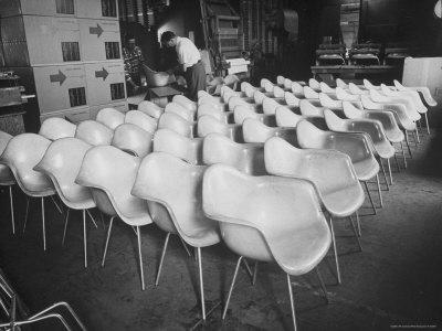 'Chairs Designed by Charles Eames Made of Molded Plastic and Plywood ...