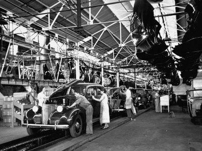 Men and Women Polishing Chevrolets on the Assembly Line at the General ...