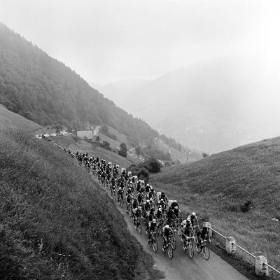 Contestants in the Grueling Tour De France are Seen on Their Way to the ...